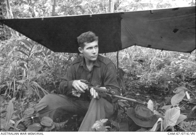 Vietnam. 1967-09. Private Roy Jakeman of Greenslopes, Qld, cleaning his ...