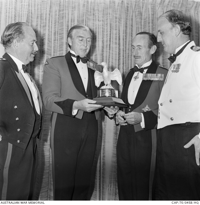 Admiring a presentation of a solid silver cormorant which was presented ...