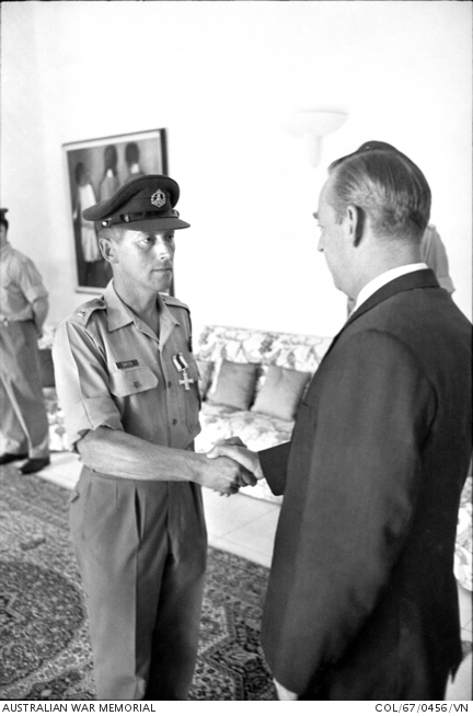 Major Harry Smith of Hobart, Tas (left), is congratulated by Australia ...