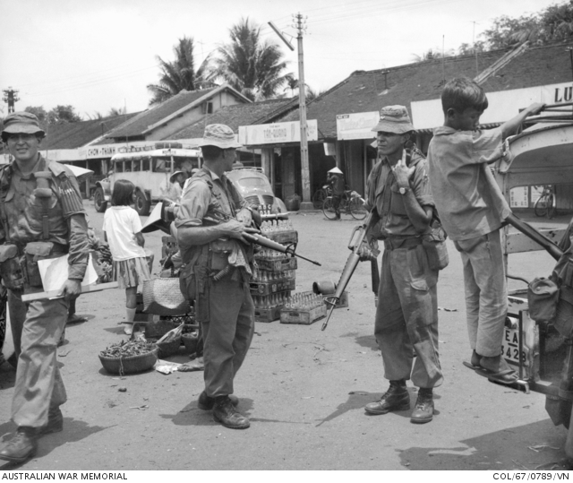 Troops of the 1st Australian Task Force prepare to search the ...