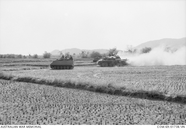 South Vietnam, 1969. An armoured personnel carrier and centurion tank ...