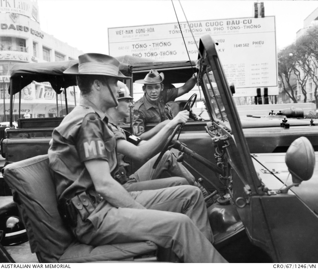 On a routine patrol in Army jeeps, Australian Army military policeman ...