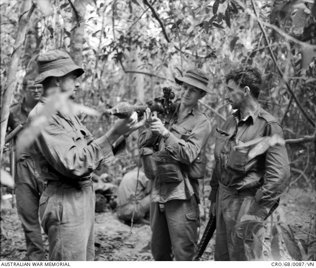 A rocket propelled gun is lined up by Second Lieutenant Jim Slavin of ...
