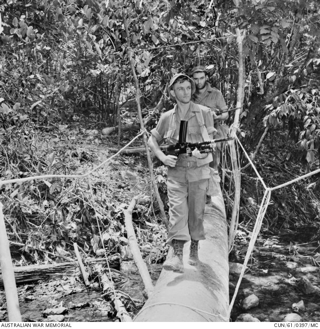 Armed with a 7.62mm L4A4 Bren light machine gun (LMG), 2/9839 Private ...