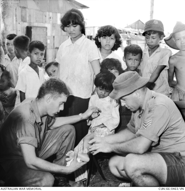 Vietnam. 1966-05-06. Private Mick Larkin of Port Moresby (left) and ...