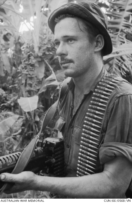 Patrolling during a search and destroy mission on Operation Enoggera ...