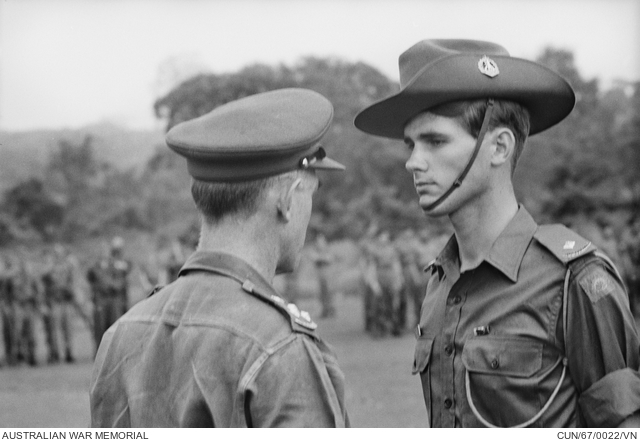 Nui Dat, Vietnam. 1967-01. A Mentioned-in-Despatches rosette is pinned ...