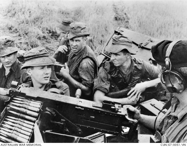 This group of Diggers on top an Armoured Personnel Carrier of the 1st ...
