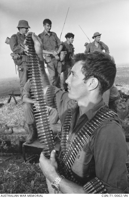 South Vietnam. February 1971. A final ammunition check by troops from ...