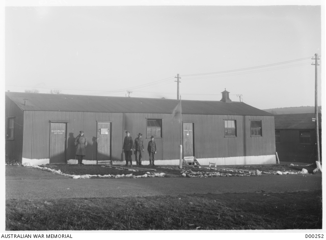 Exterior view of the medical hut and staff at the 12th Training ...