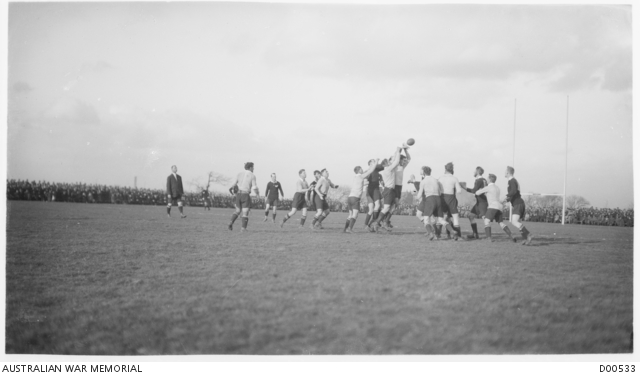 Going up for the ball in the Army rugby football match between New ...