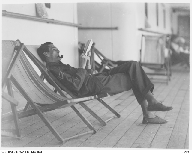 Portrait of 2779 Pay Sergeant Sydney Clive Burrows sitting in his deck ...