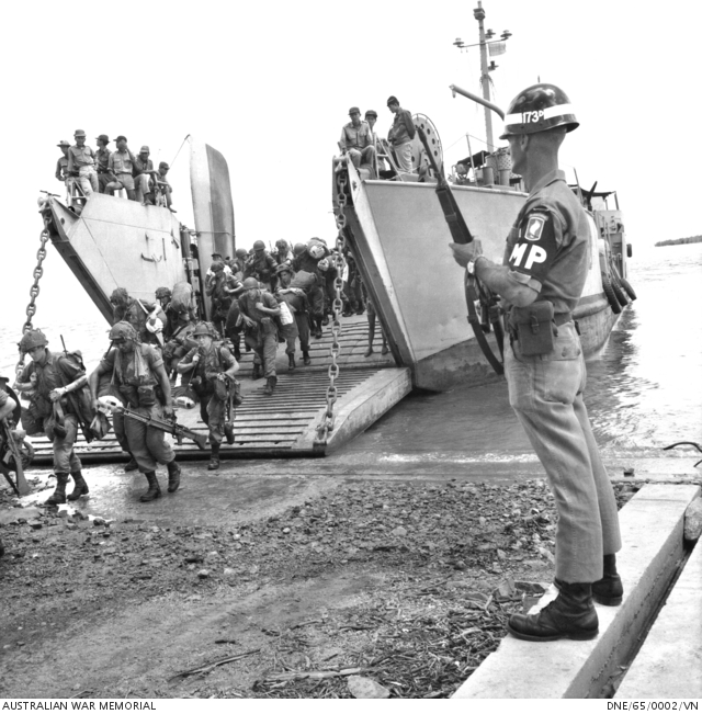 Vietnam. 1965. A soldier of the US 173rd Airborne Brigade stands by as ...