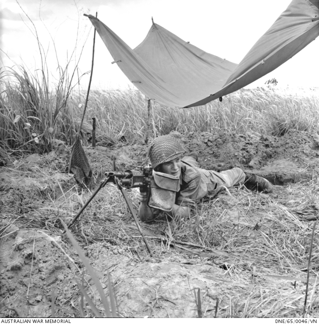 Bien Hoa, Vietnam. 1965-06. Under a makeshift groundsheet shelter ...