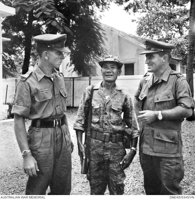 Two members of the Australian Army Training Team Vietnam (AATTV) talk ...