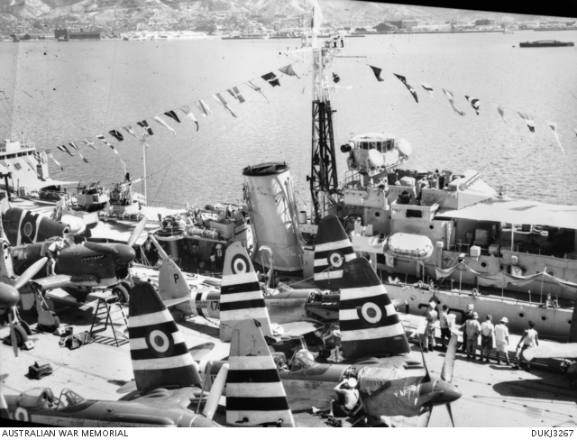 The aircraft carrier HMS Triumph, with her attendant destroyer HMS ...