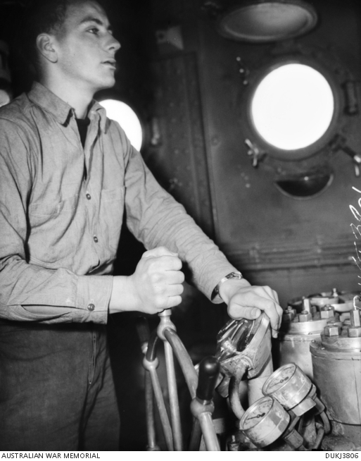 The quartermaster of HMAS Bataan, 35469 Able Seaman C W Bales, from ...