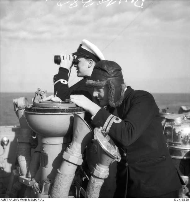 Australian and British officers share a watch on HMAS Warramunga during ...