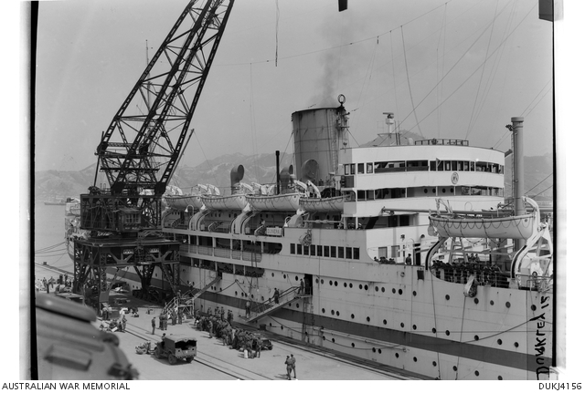 Unidentified British troops and sailors boarding the transport ship ...