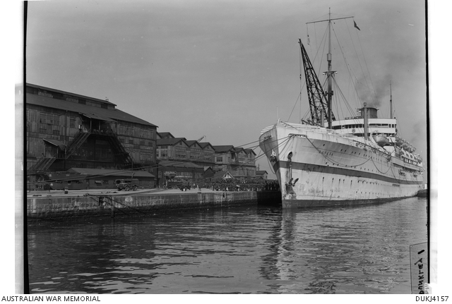 Unidentified British troops and sailors boarding the transport ship ...