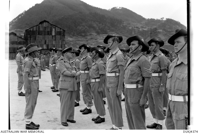 Major General F Kingsley Norris, CBE, DSO ED, chats with reinforcements ...