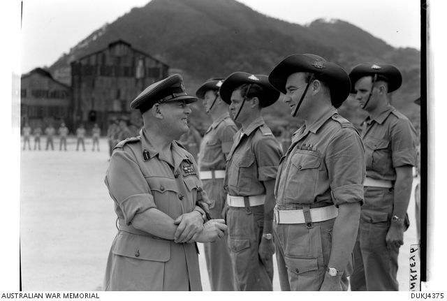Major General F Kingsley Norris, CBE, DSO ED, chats with reinforcements ...