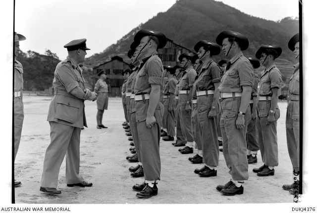 Major General F Kingsley Norris, CBE, DSO ED, chats with reinforcements ...
