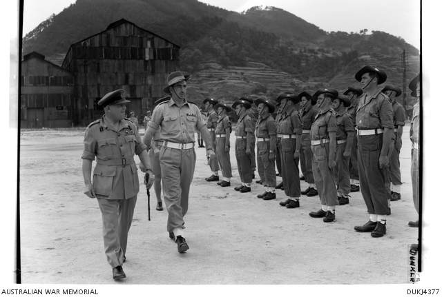 Major General F Kingsley Norris, CBE, DSO ED, chats with reinforcements ...