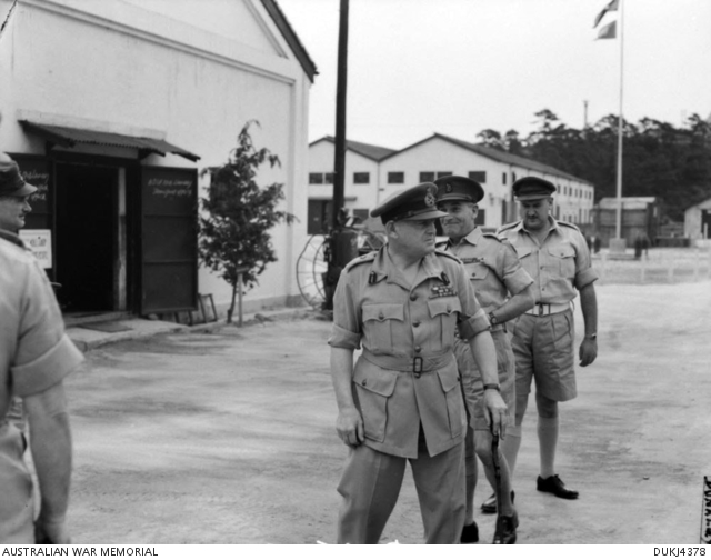 Major General F Kingsley Norris, CBE, DSO ED, chats with reinforcements ...