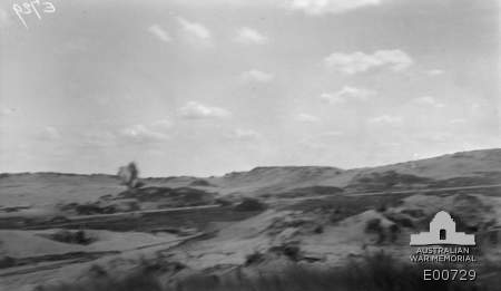 A German shell bursting on the dunes just beyond the Oost Dunkerque ...