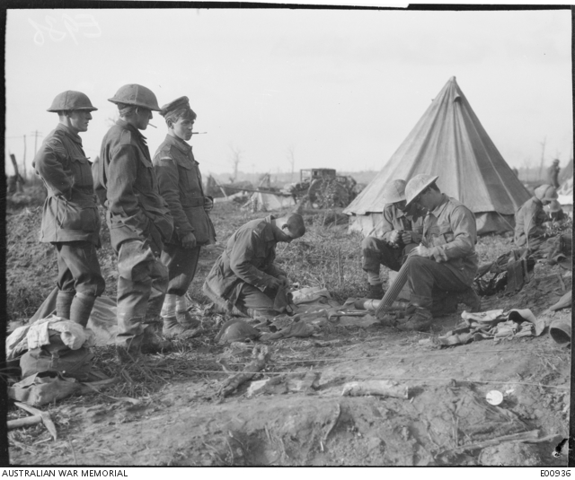 The two survivors of a 40th Battalion Lewis Gun crew cleaning their ...