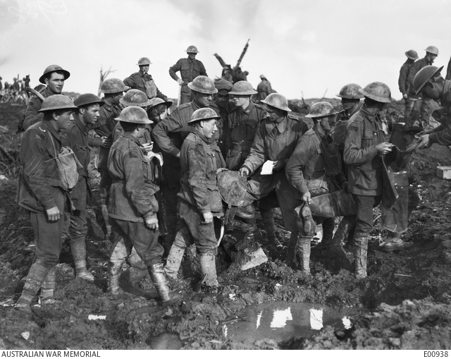 Field Artillery personnel being issued with trench waders for working ...