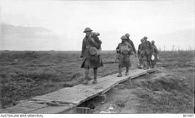 A Lewis gun team on a duckboard track near Lake Farm, in the Ypres ...