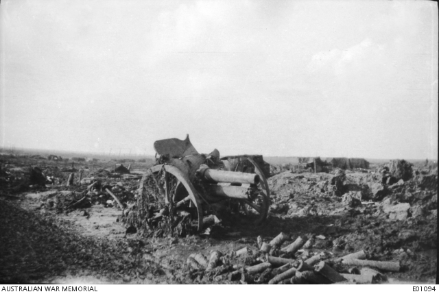 View of a damaged howitzer gun fast in the mud near Bavaria House, east ...
