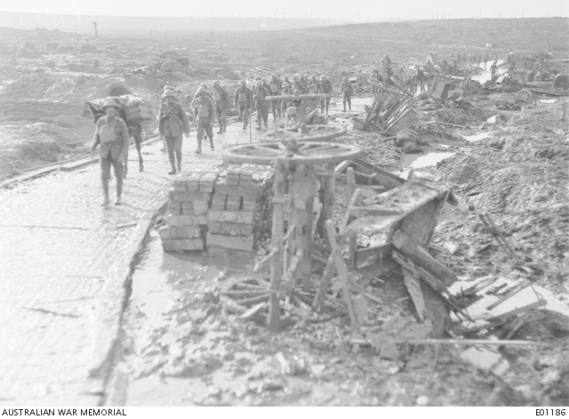 Australian troops passing along the track leading to Idiot Corner, at ...