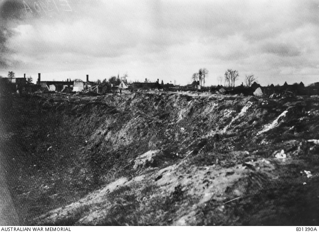 A huge crater caused by a mine which had exploded about a week after ...