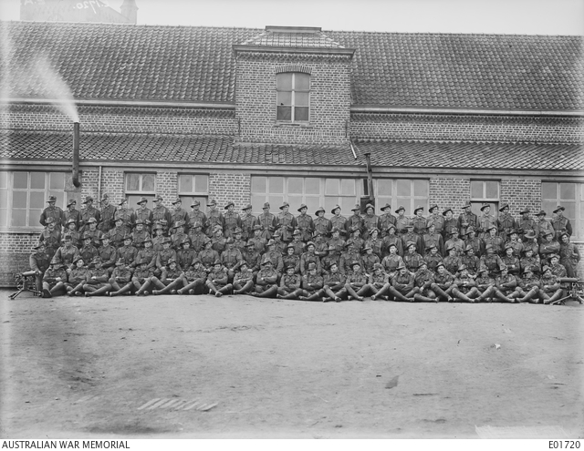 Group portrait of the 13th Machine Gun Company, in billets at time of ...