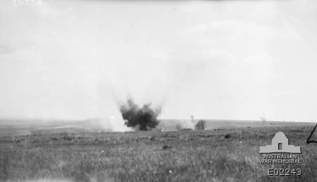 A German shell bursting near the Brickworks on the high ridge to the ...