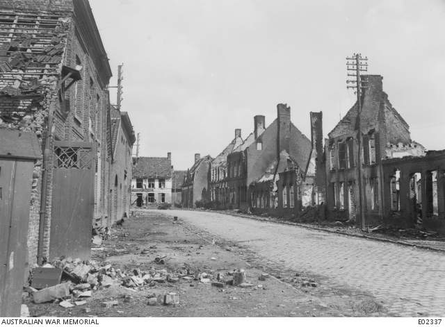 The damaged remains of houses in ruins where the Headquarters of the ...
