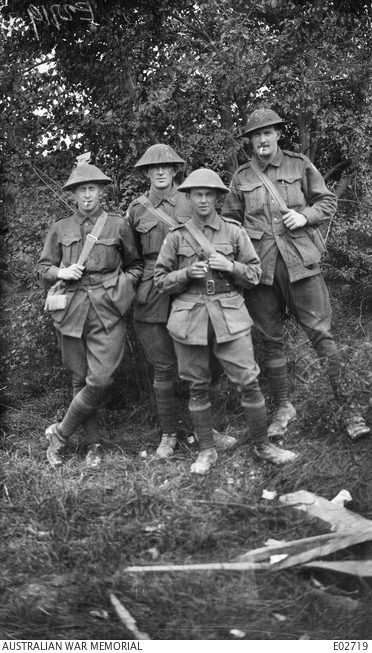 Outdoor portrait of four officers of the 28th Battalion, AIF ...