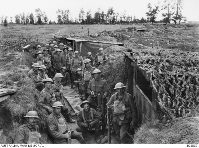 A group of unidentified men of 6th Battalion in the front line about 1. ...