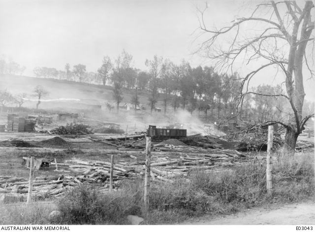 The railway dump near Chuignolles, set on fire by one of our shells ...