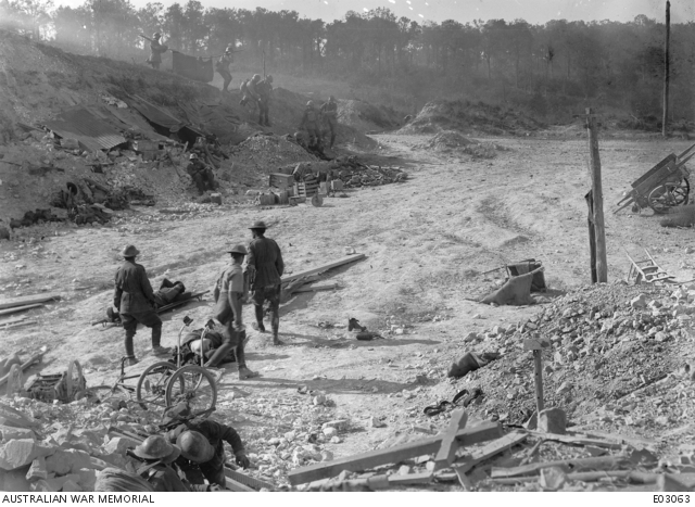 The wounded of the 34th Battalion being brought by captured German ...
