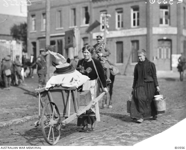 Two liberated French civilians (women) in the retaken French village ...