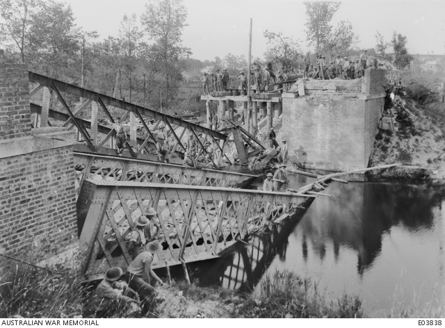Australian Pioneers engaged in re-erecting the bridge at Chipilly ...
