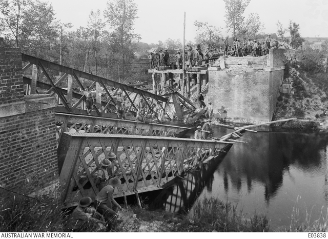 Australian Pioneers engaged in re-erecting the bridge at Chipilly ...