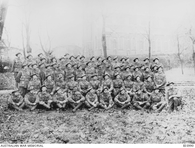 An outdoors group portrait of unidentified members of B Company of the ...