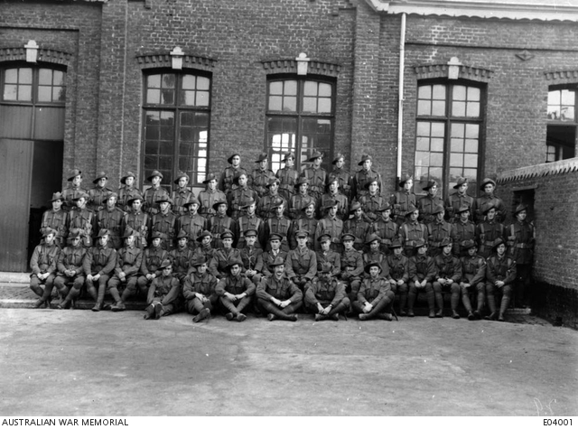An outdoors group portrait of unidentified members of A Company of the ...
