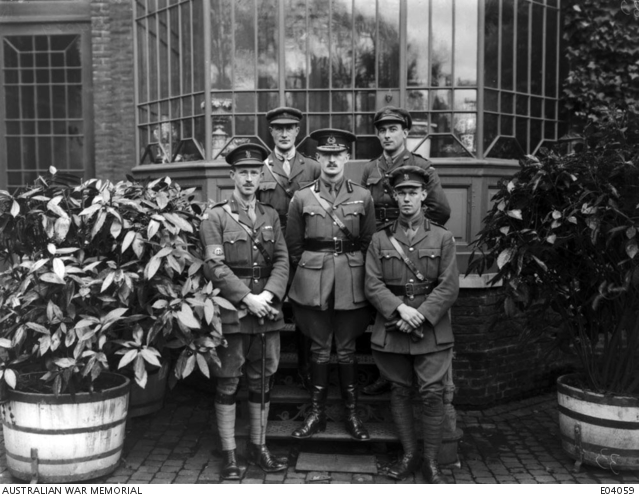 An outdoors group portrait of the General Officer Commanding, Brigadier ...