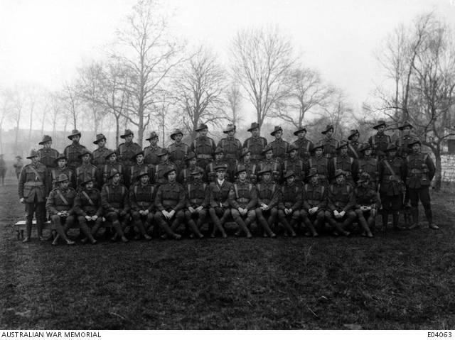 An outdoors group portrait of members of the Headquarters Details of ...